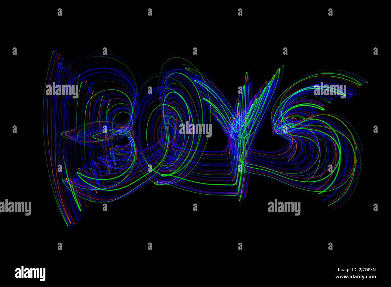 The word 'Boys' written in the air with bright neon coloured motion ...