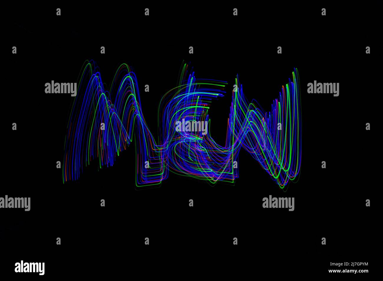 The word 'Men' written in the air with bright neon coloured motion ...