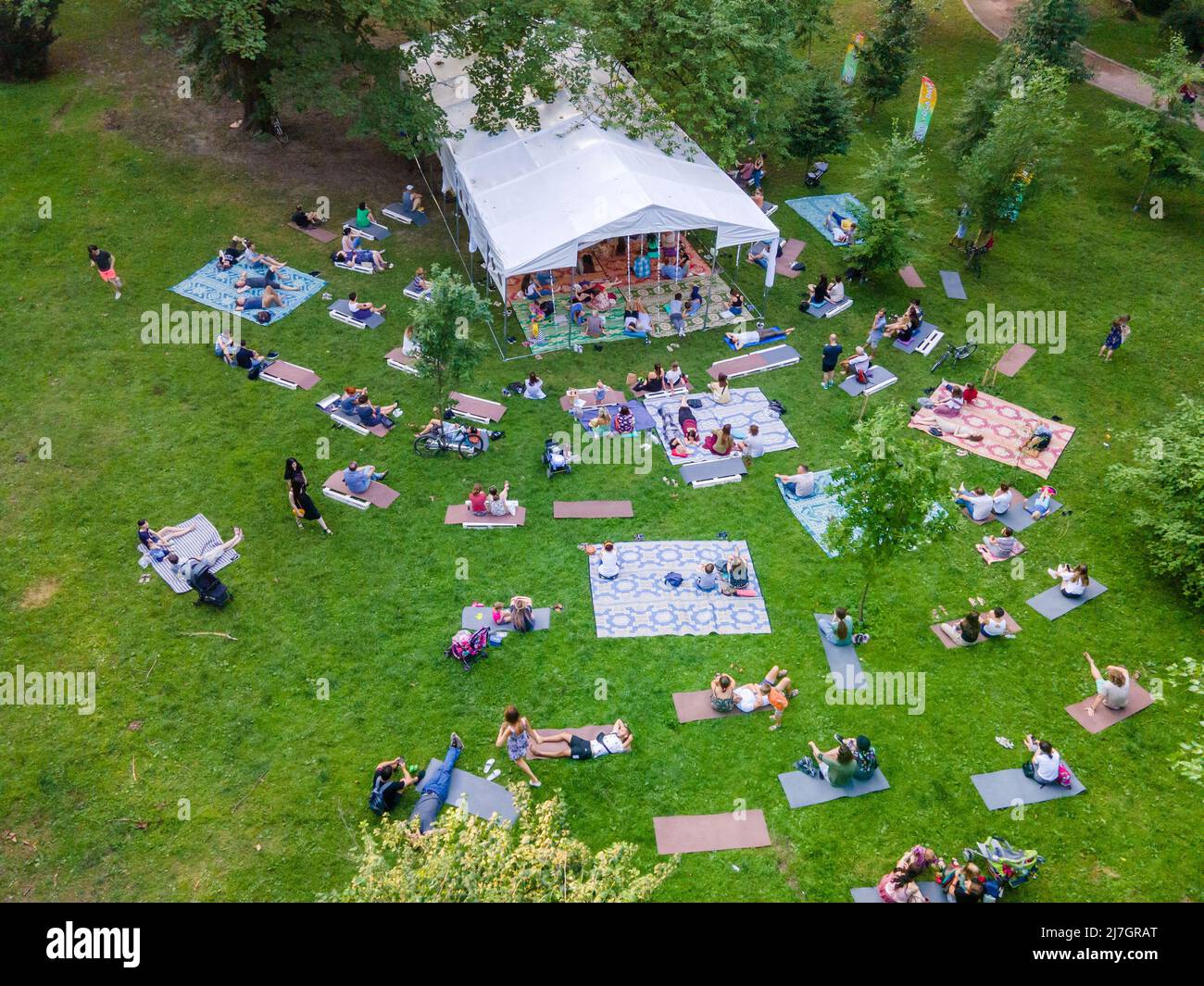 people laying down at city public park overhead top view outside ...