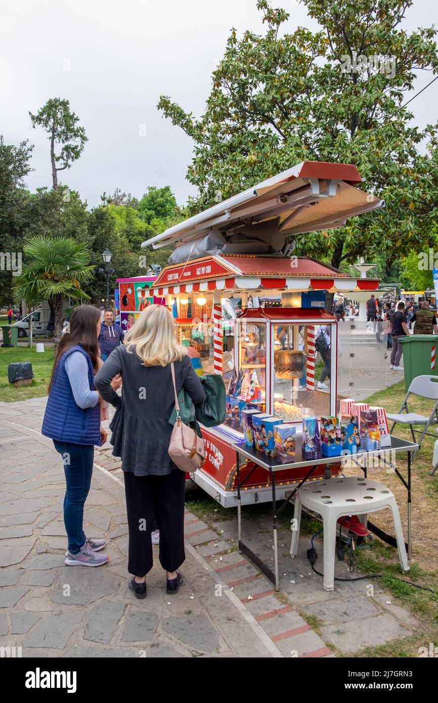 People ordering in the popcorn stand on the Dinosaur Festival in ...
