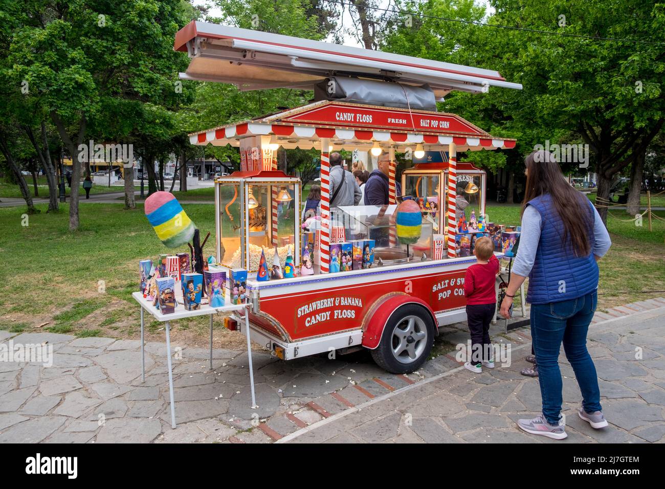 People ordering in the popcorn stand on the Dinosaur Festival in ...