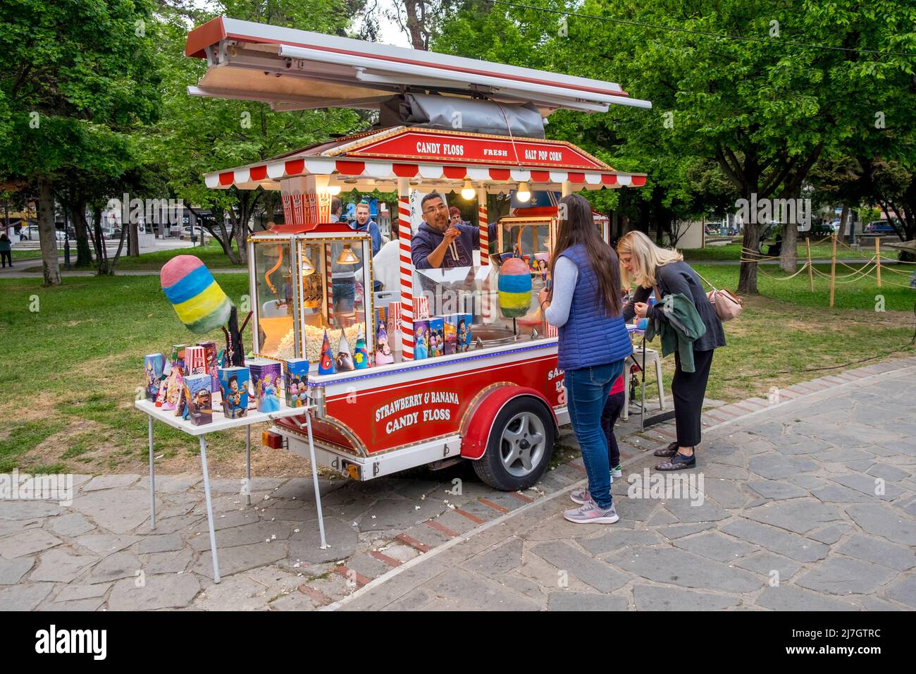 People ordering in the popcorn stand on the Dinosaur Festival in ...