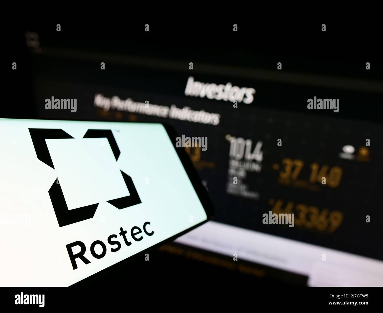 Smartphone with logo of Russian defense company Rostec on screen in ...