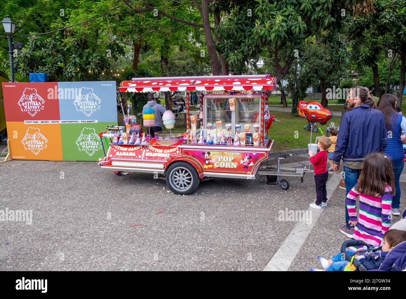 People ordering in the popcorn stand on the Dinosaur Festival in ...
