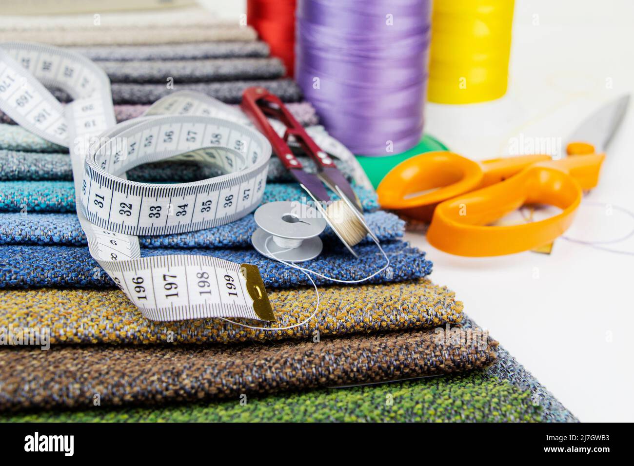 Colorful sewing thread, background, tailor-related images. On a white ...