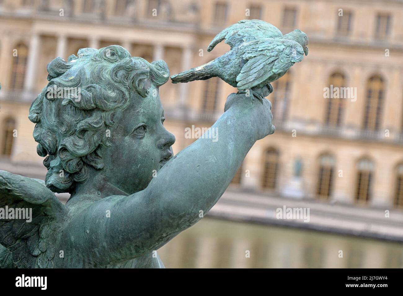 Cherub statue with Dove, Versailles Palace, Paris, France Stock Photo ...