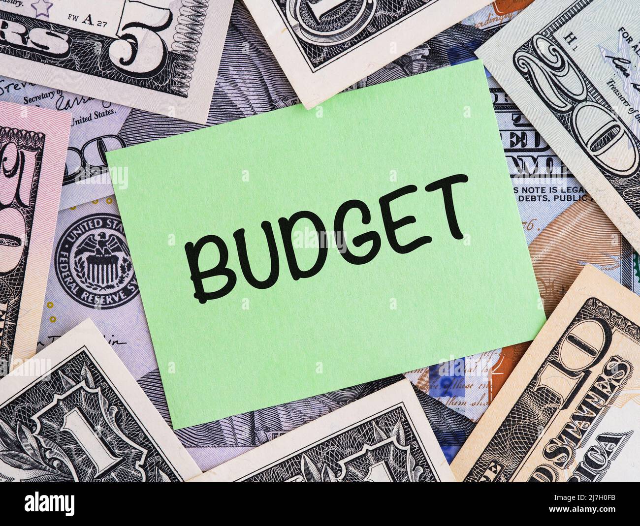 A Green paper note with word Budget on a United States Dollar bills ...