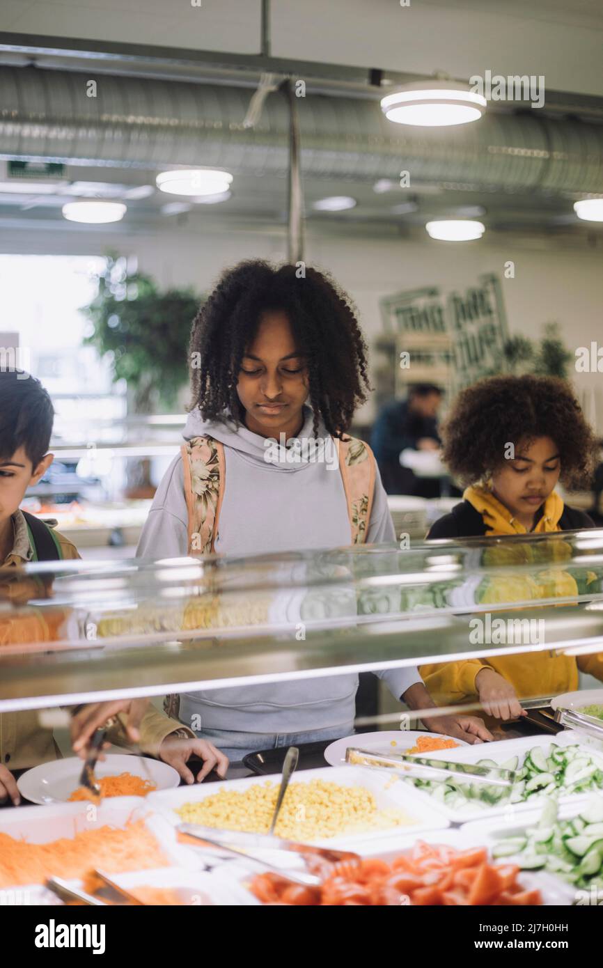 School cafeteria boys 13 hi-res stock photography and images - Alamy