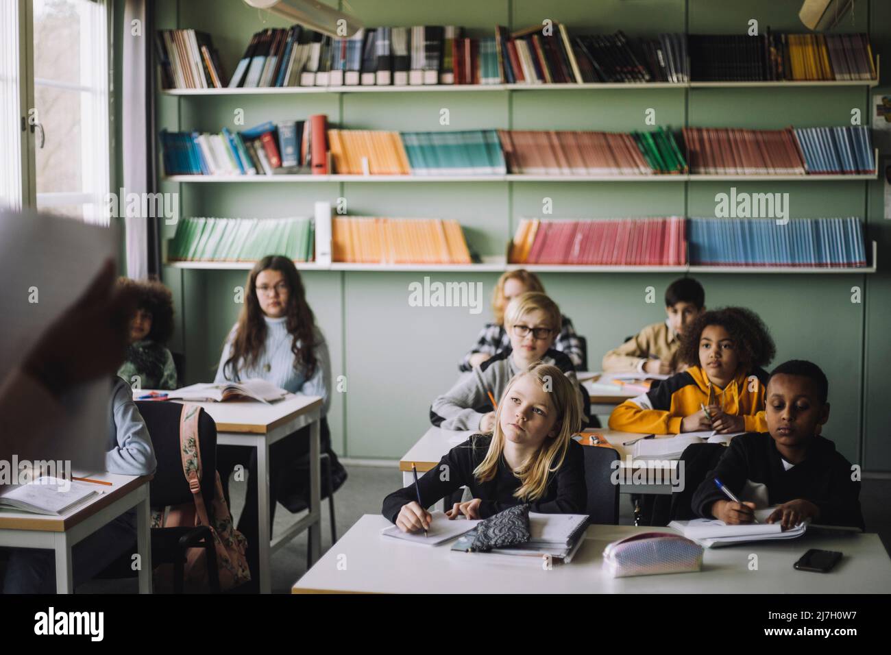 Diverse middle school students writing hi-res stock photography and ...