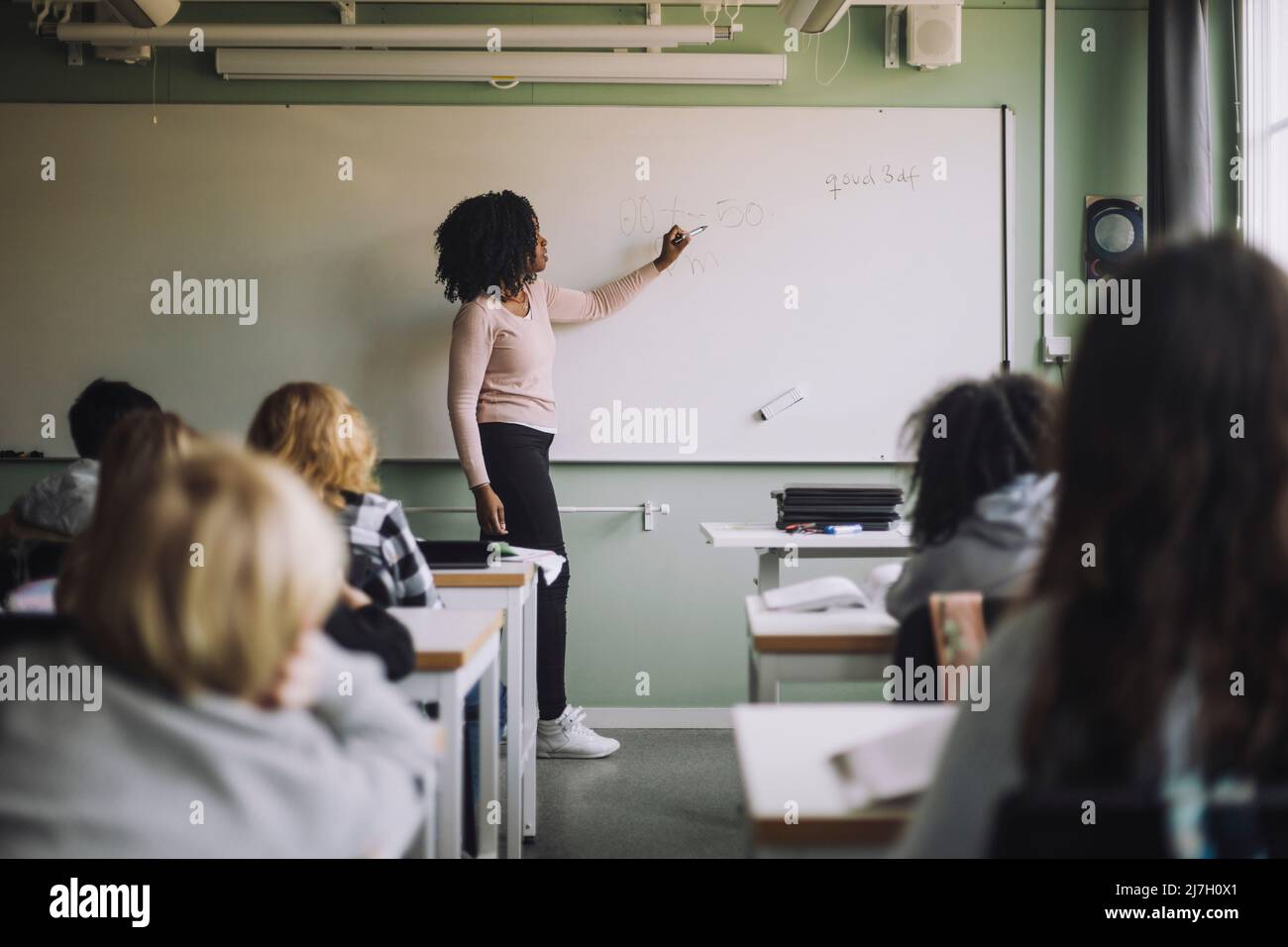 Primary school back view teacher hi-res stock photography and images ...