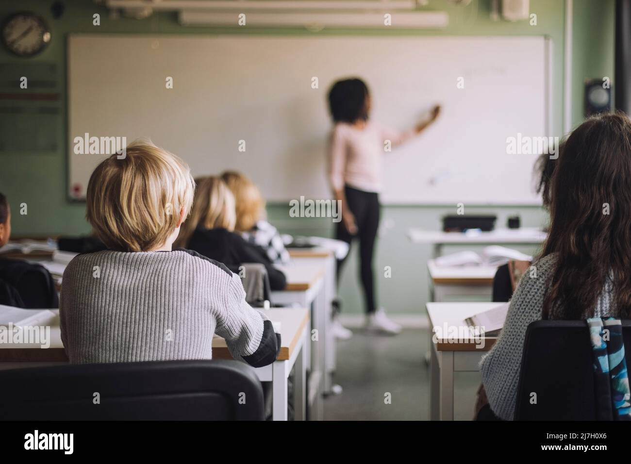 Student sitting at desk, 13 hi-res stock photography and images - Alamy