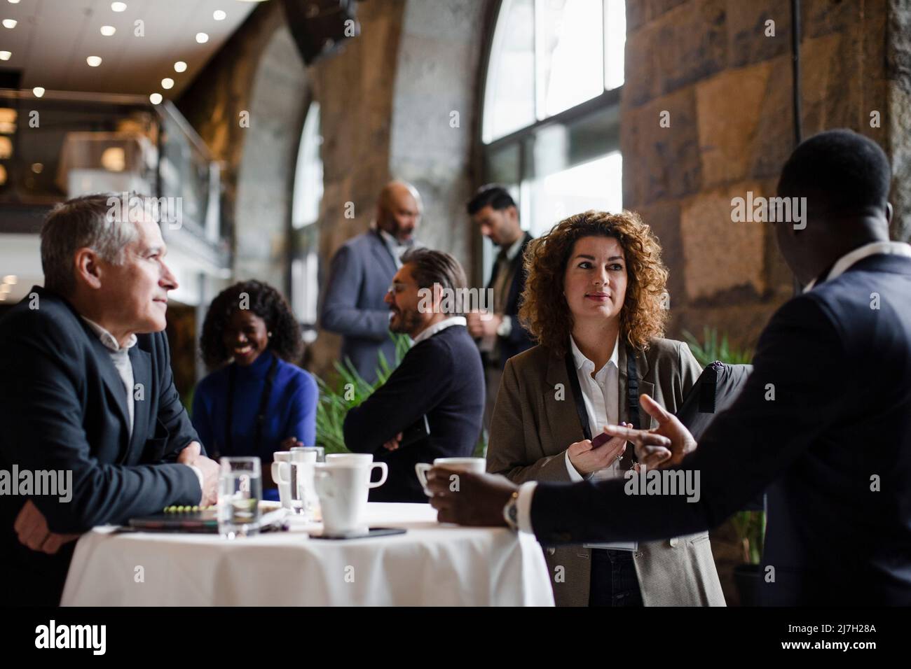 Delegates gathering hi-res stock photography and images - Alamy