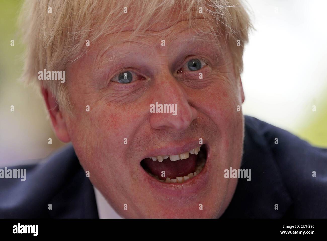 Prime Minister Boris Johnson speaks with stallholders during an event ...