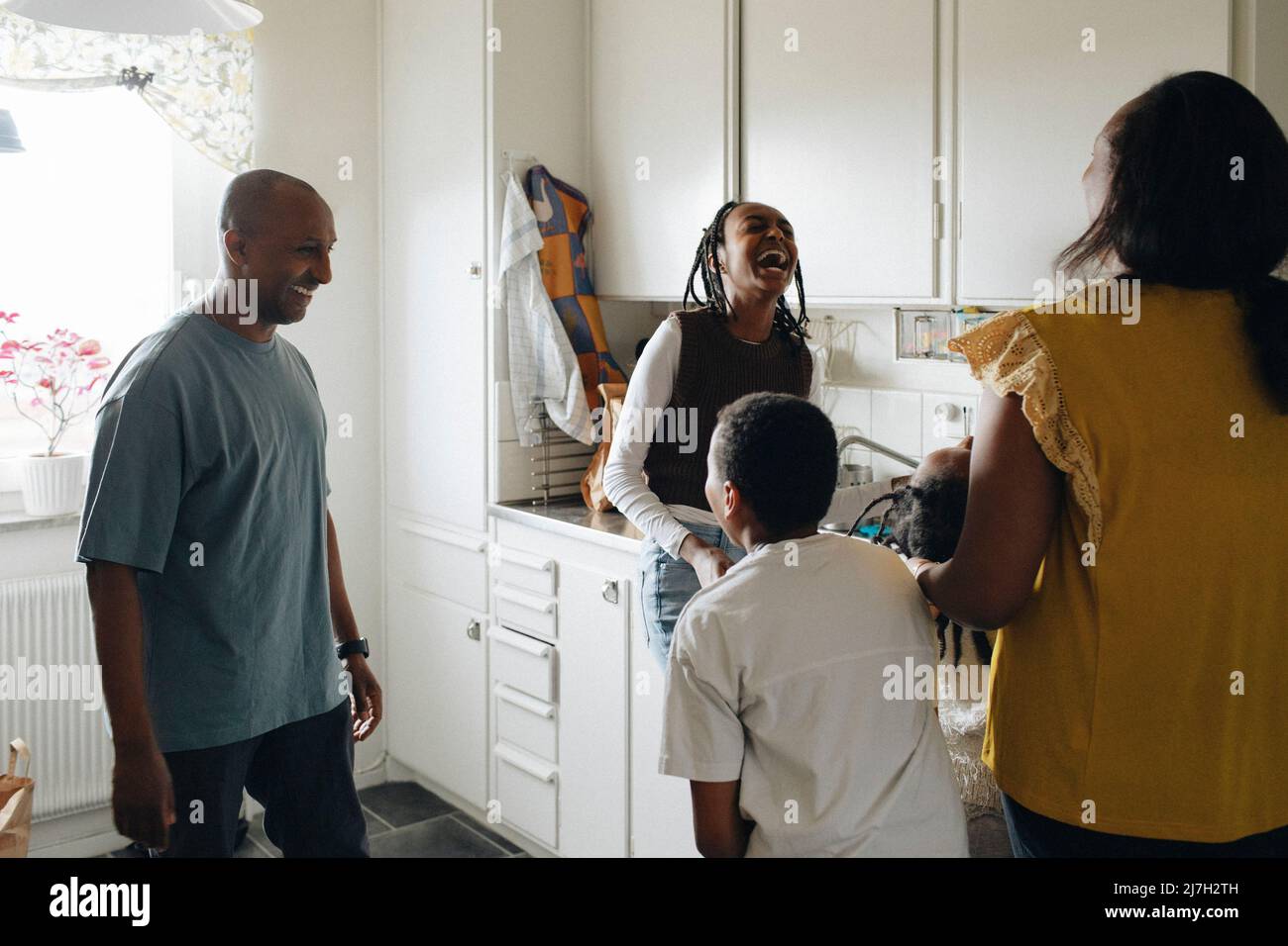 Family home having fun hi-res stock photography and images - Alamy