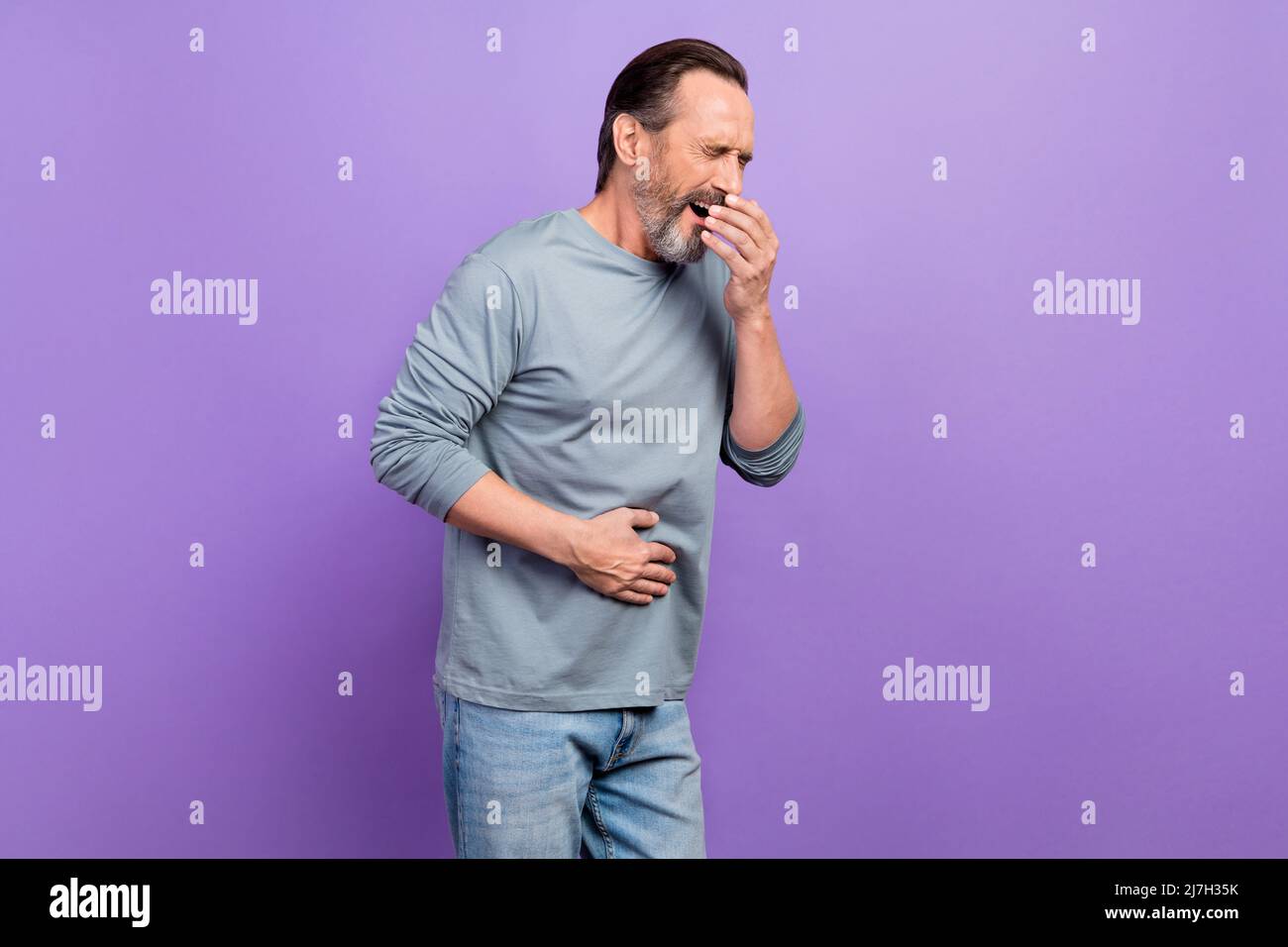 Portrait of unsatisfied person arm on stomach palm cover mouth feel bad ...