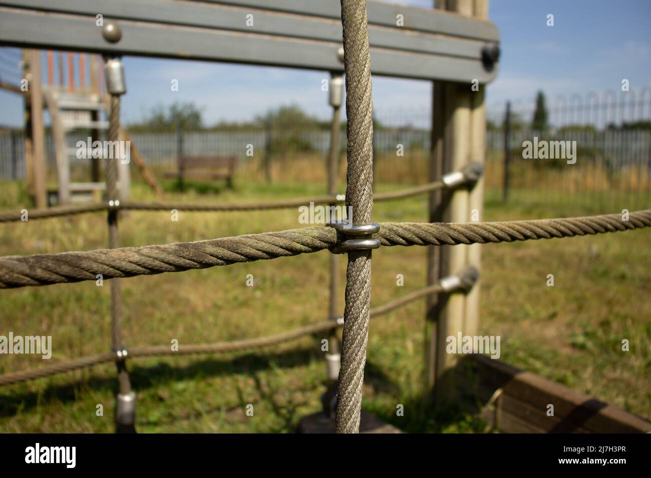 close up of rope and wire climbing equipment in a children's play park ...