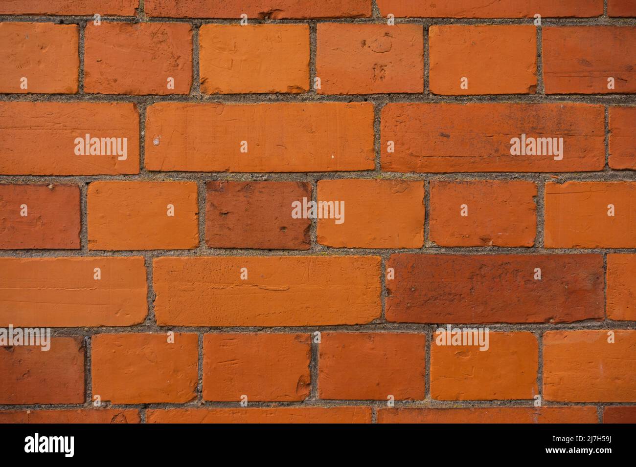 modern textured dark red brick wall Stock Photo - Alamy