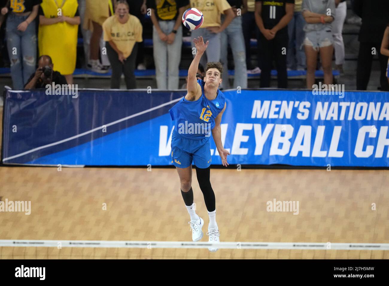 UCLA Bruins outside hitter Alex Knight (12) serves the ball against the ...