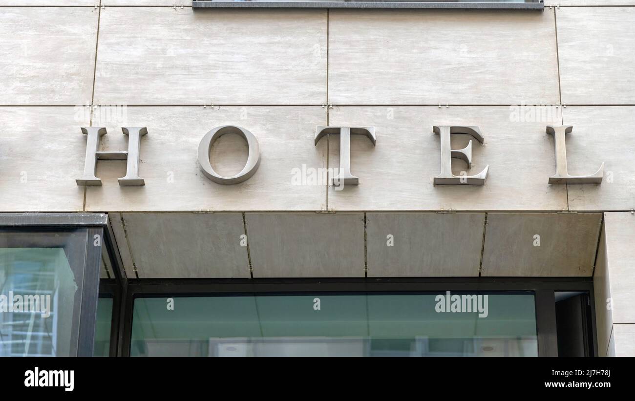 3d Metal Sign Hotel at Marble Tiles Wall Stock Photo - Alamy