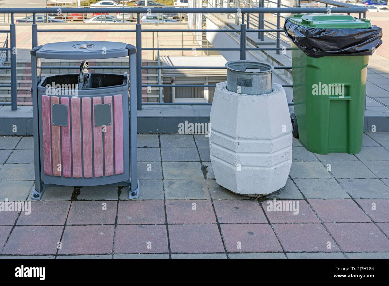 Three Different Recycling Litter Bin Trash Can at Street Pavement Stock ...