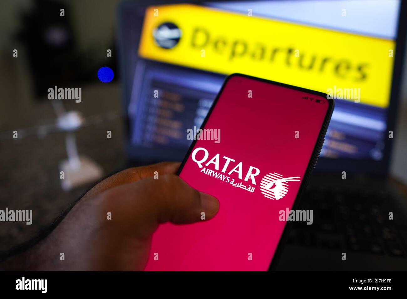 In this photo illustration, the Qatar Airways logo seen displayed on a ...