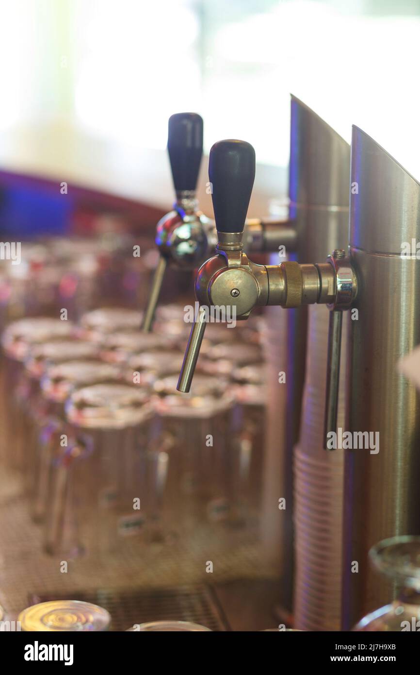 Close up of beer lines for draft beer in restaurant. Silver Cranes for ...