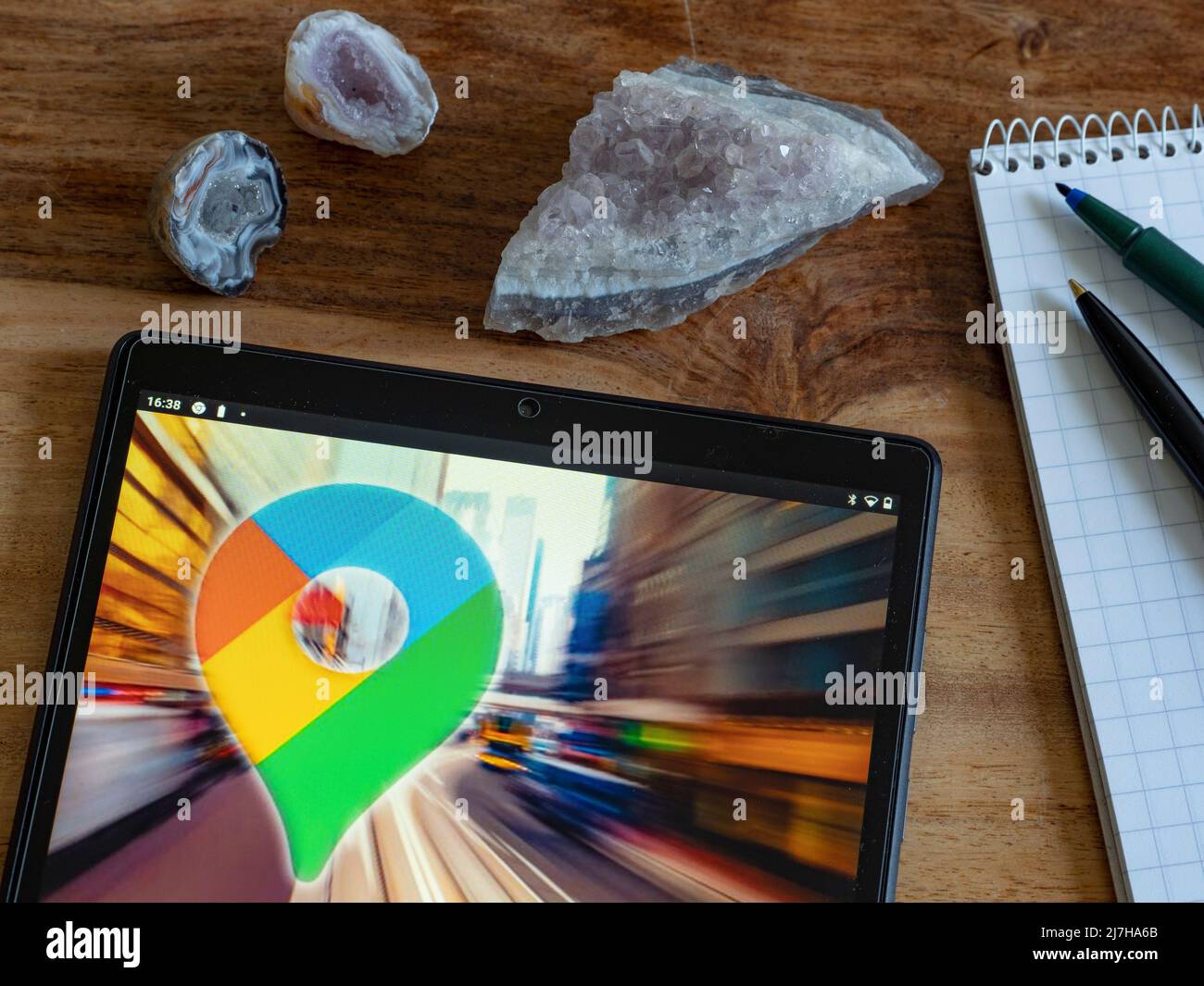 In this photo illustration Google Maps logo seen displayed on a tablet ...