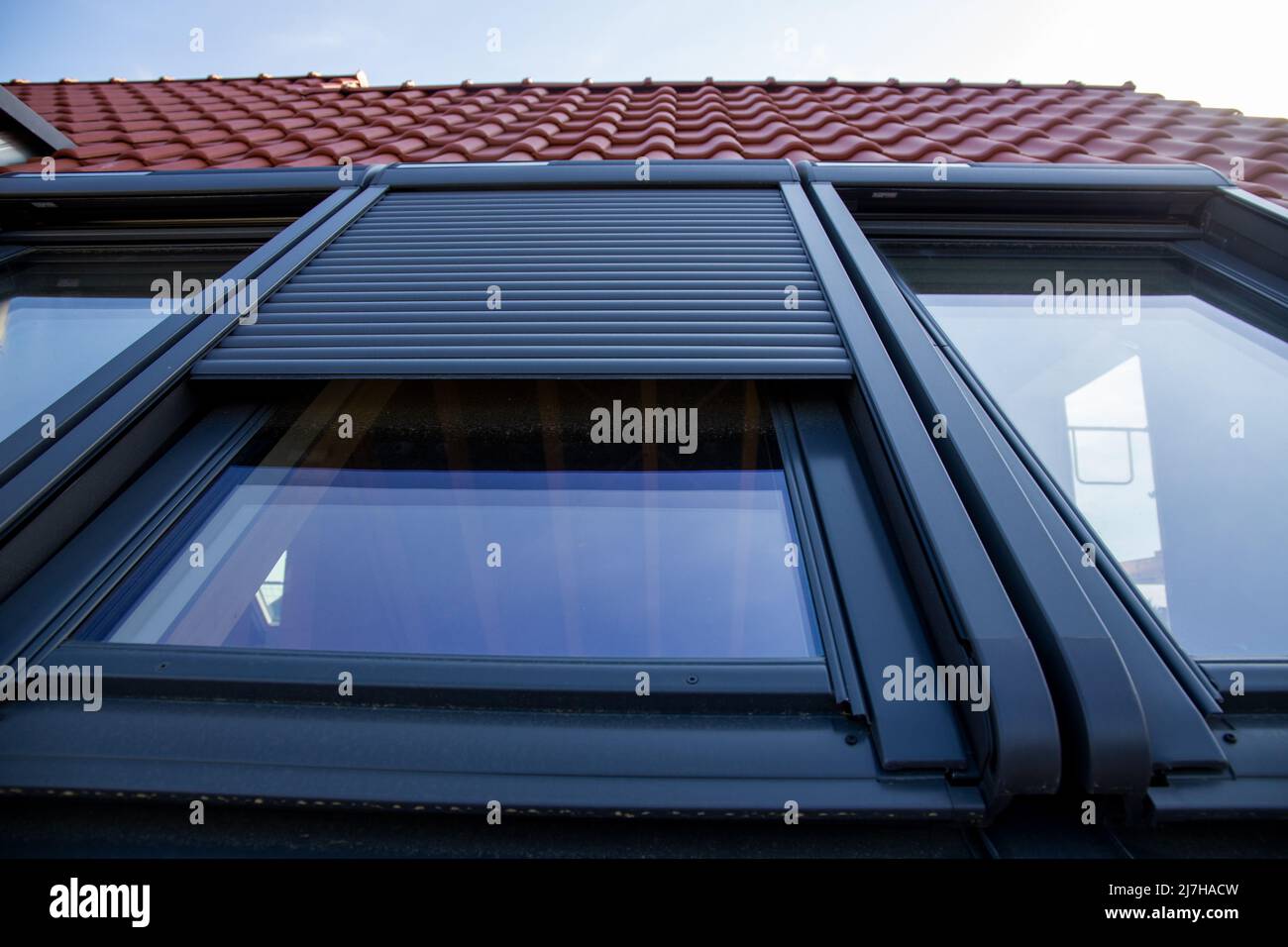 Close up of new skylight with roller shutter Stock Photo - Alamy