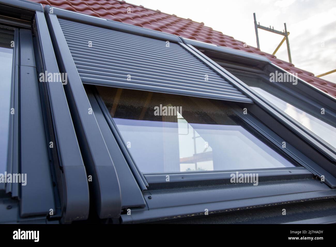 Close up of new skylight with roller shutter Stock Photo - Alamy