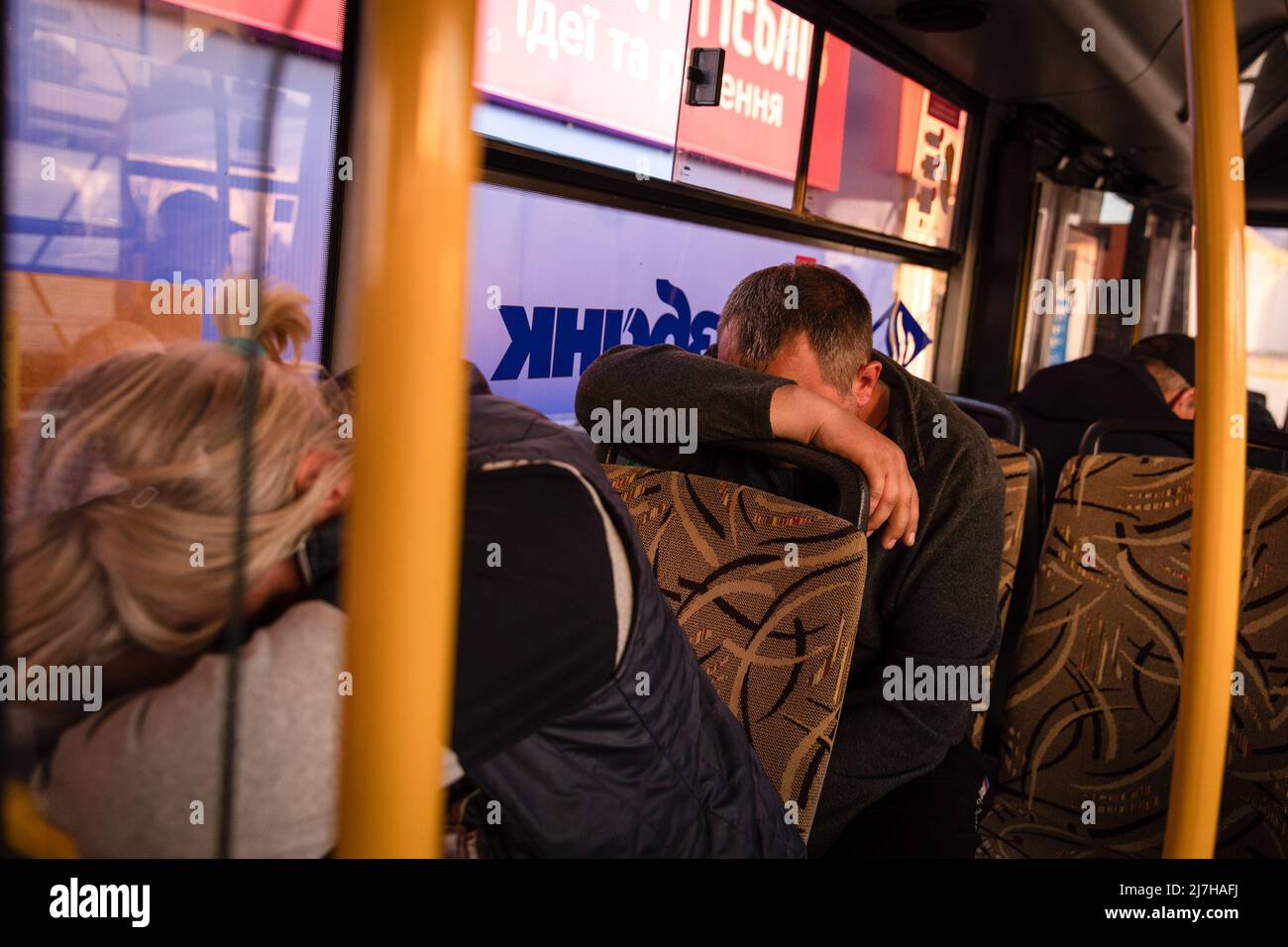 Evacuees Evacuated From Mariupol To Zaporizhia Rest In A Bus On Sunday