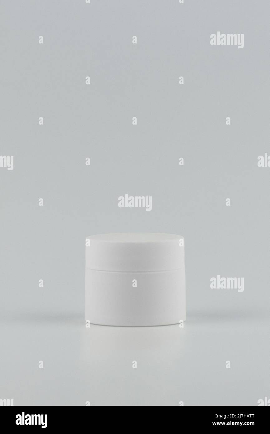 Unbranded white plastic jar for cosmetics products. Skincare and ...