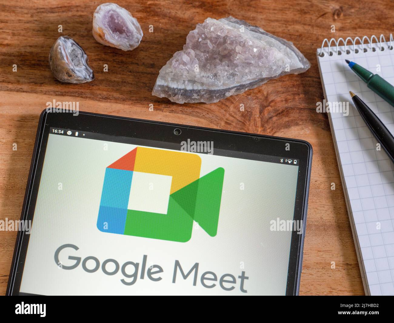 In this photo illustration Google Meet logo seen displayed on a tablet ...