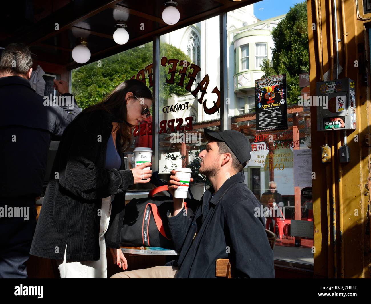 Customers enjoy coffee, espresso and pastries at the iconic Caffe ...