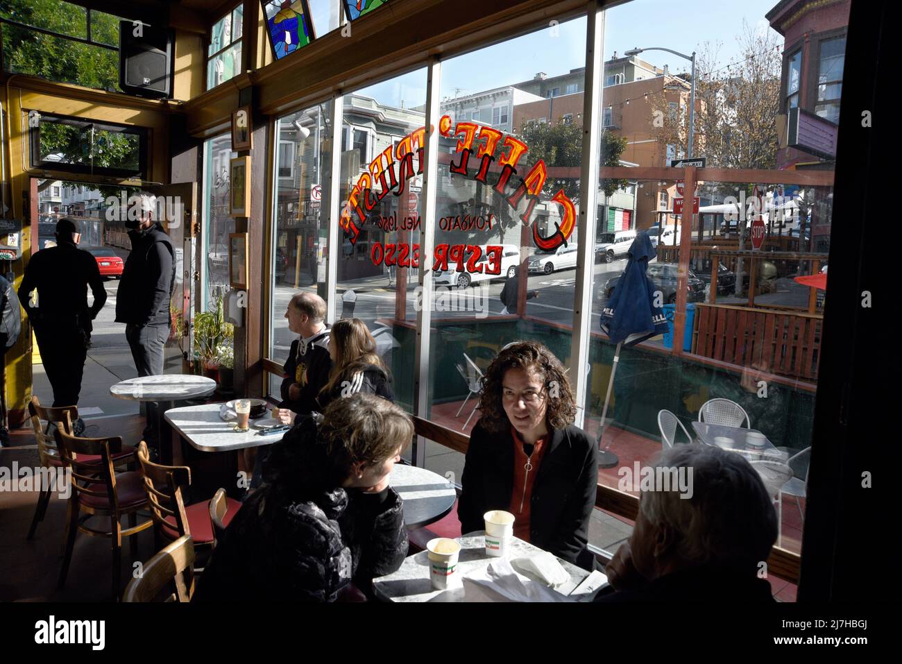 Customers enjoy coffee, espresso and pastries at the iconic Caffe ...