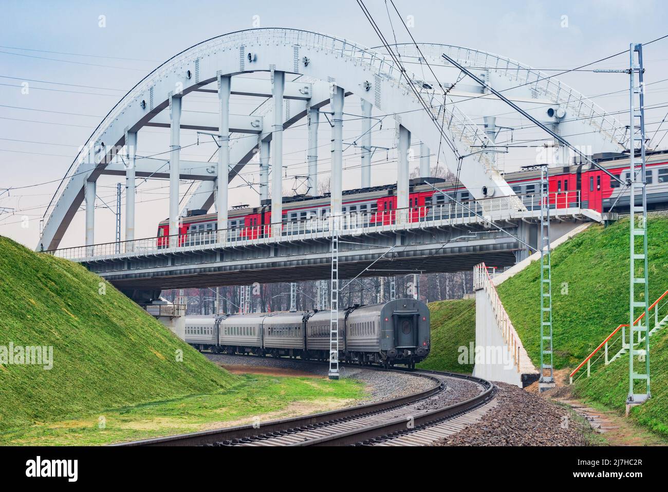 Passenger trains moves to the different directions Stock Photo - Alamy