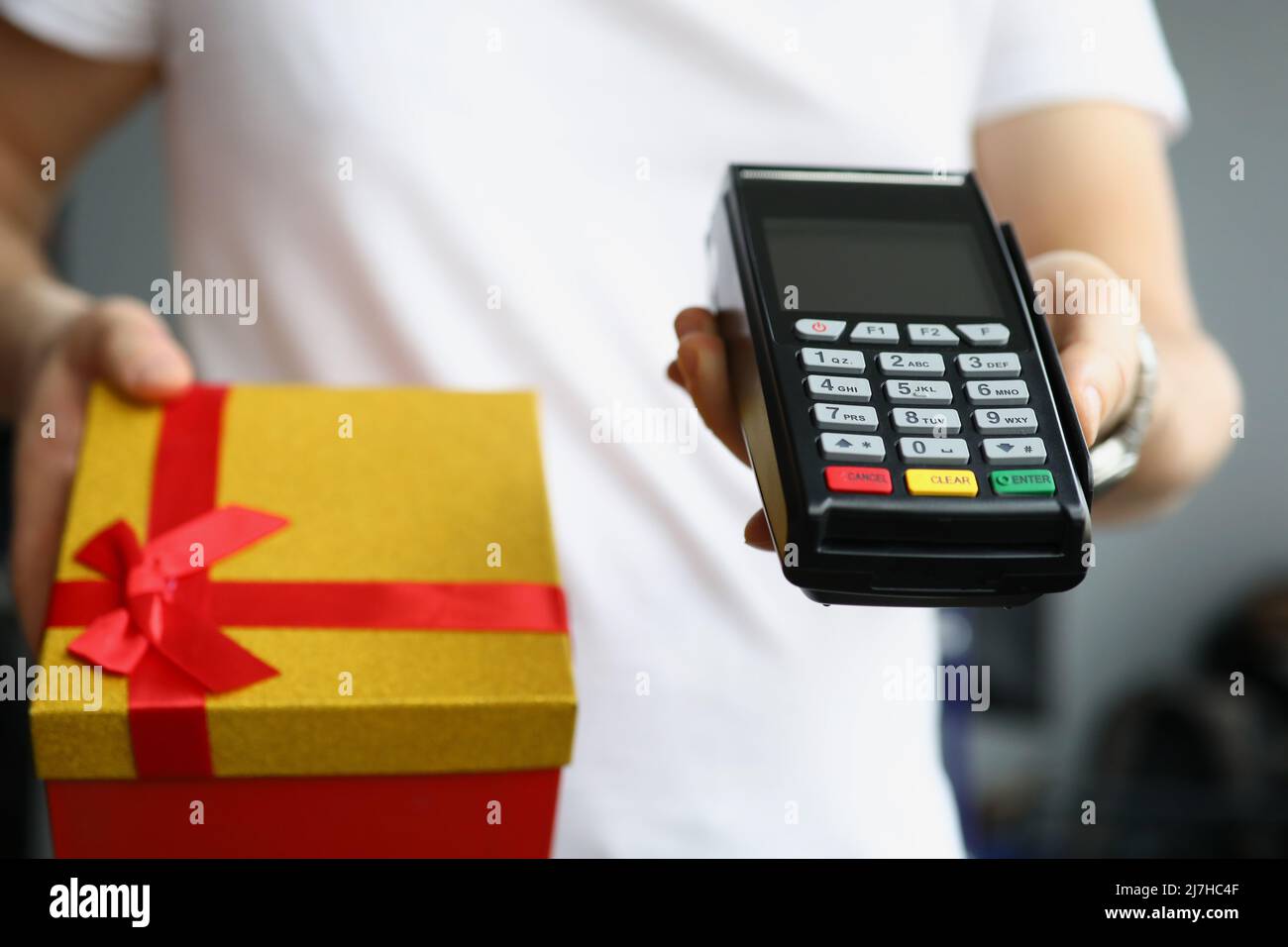 Man courier give credit card reader machine for cashless payment ...