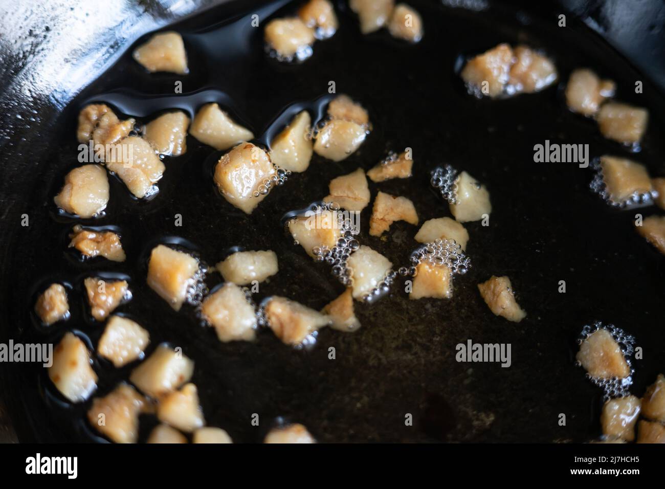 The greaves are fried in a pan. Traditional food of Ukrainians Stock ...