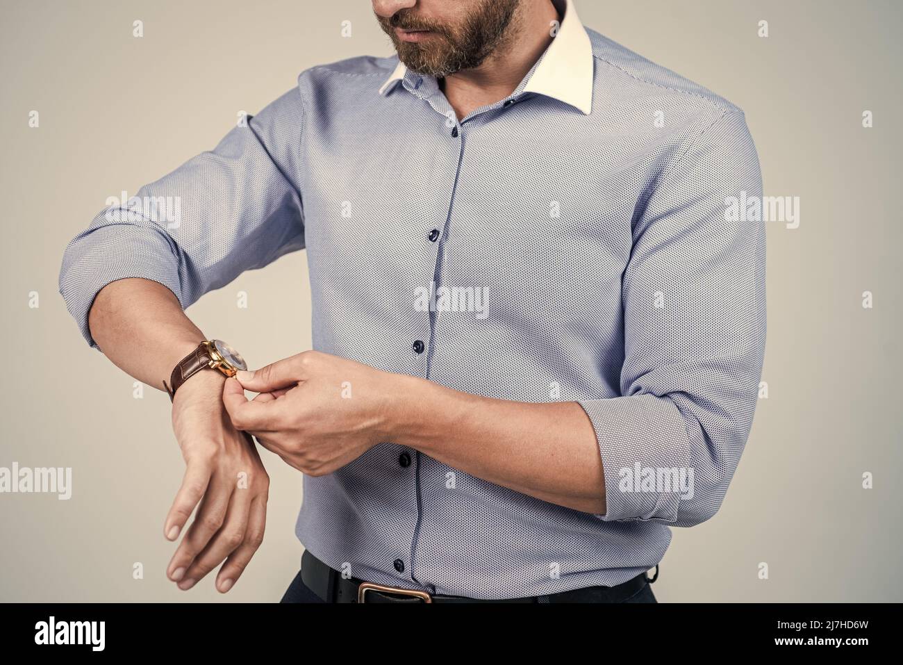 cropped man checking time. wristwatch on male hand of ceo. you are late ...