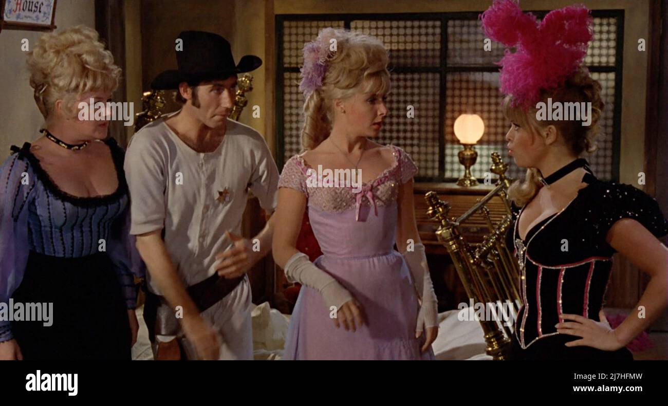 London.UK. Joan Sims, Jim Dale, Angela Douglas and Edina Ronay in a ...