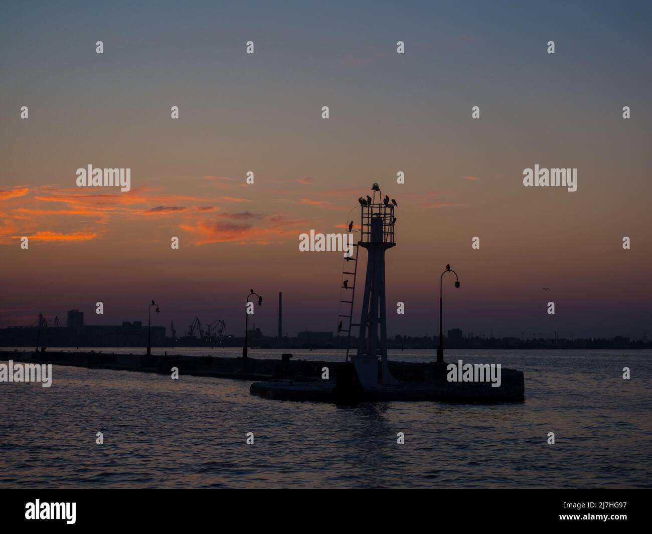 black sea port Odesa, Ukraine with a lot of cranes, cabins, boxes and ...