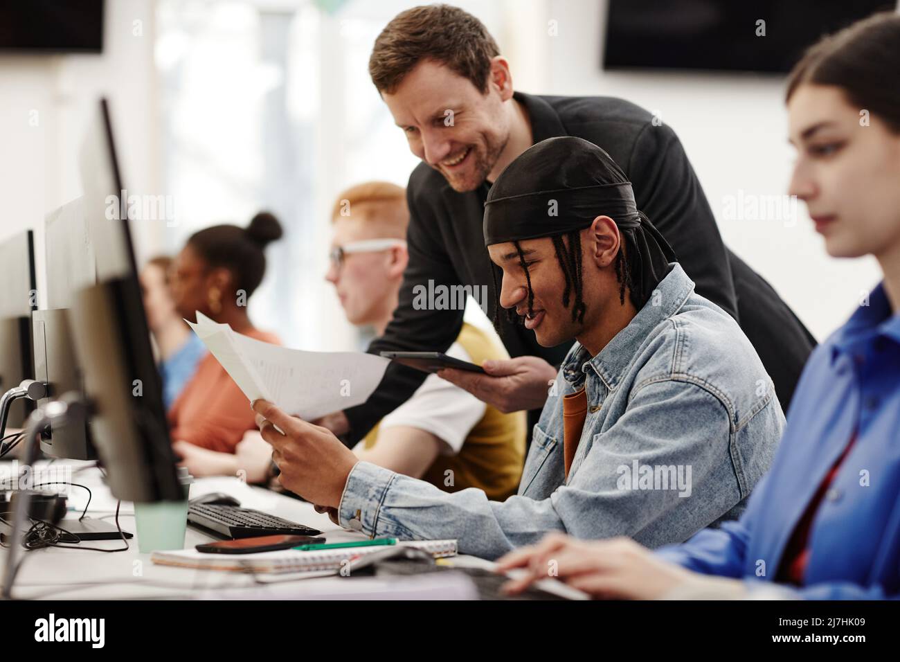 African american student in computer lab hi-res stock photography and ...