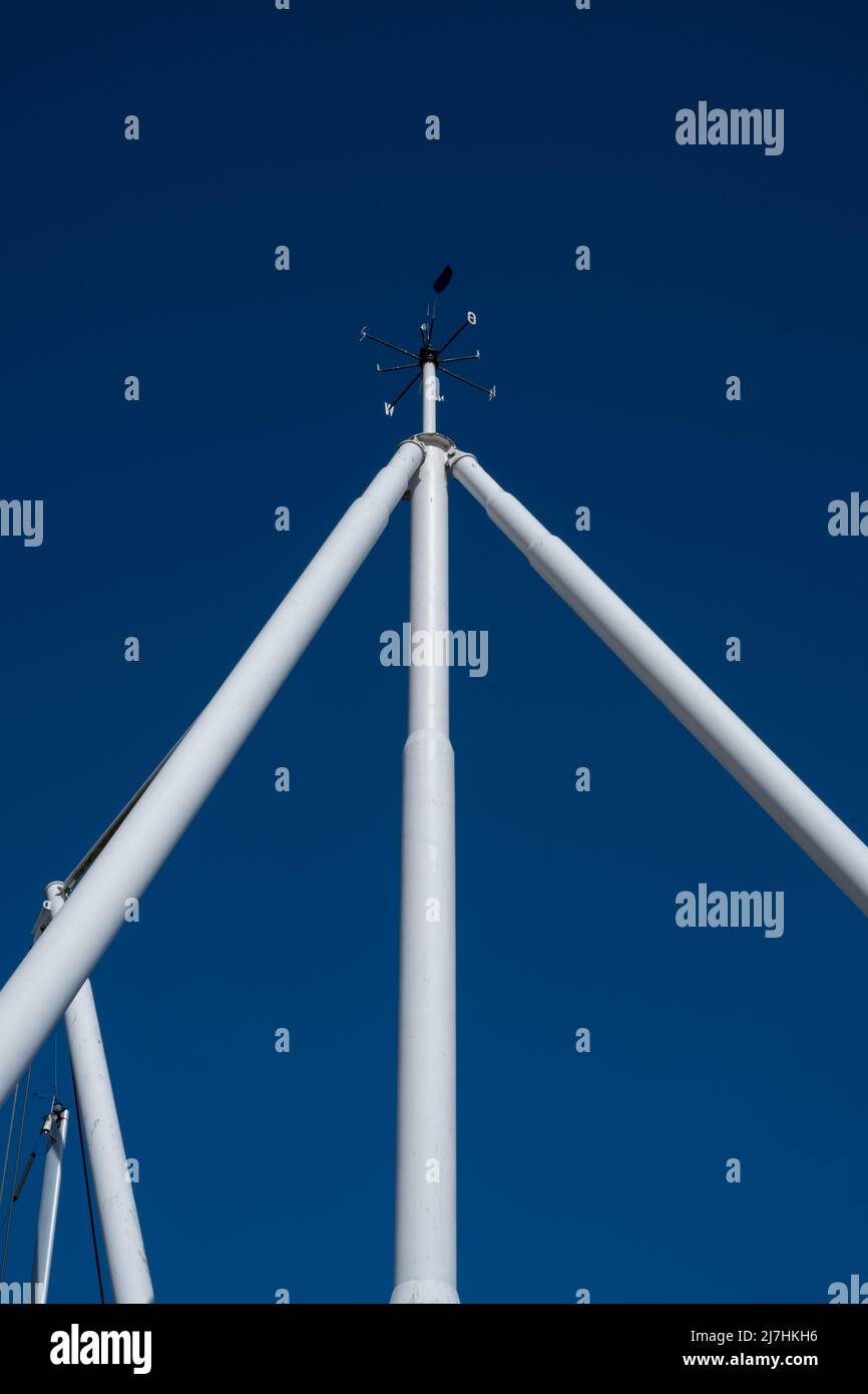on a white mast there is a wind direction indicator Stock Photo - Alamy