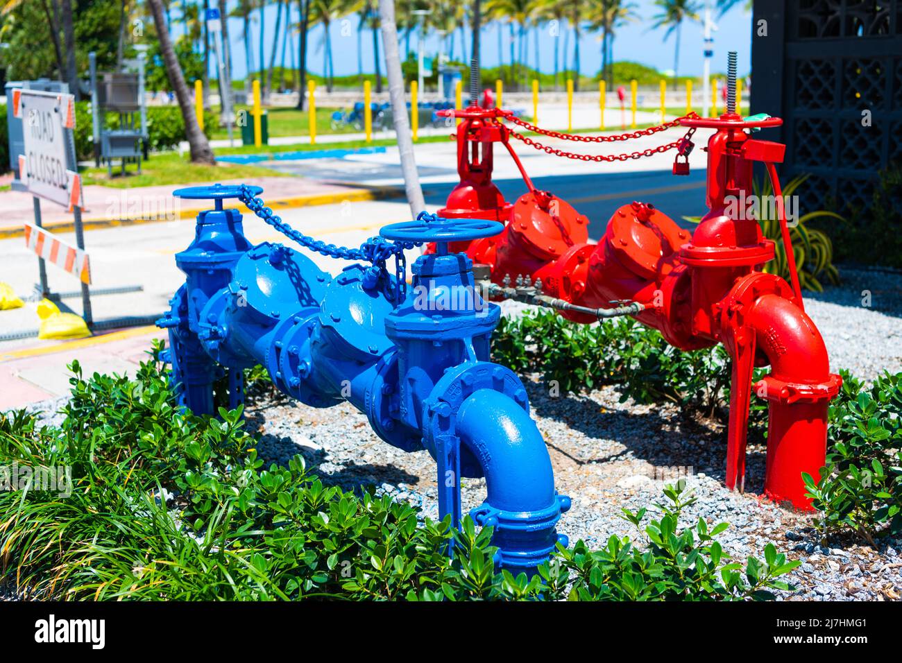 red and blue hydrant pipe. fireplug valve Stock Photo - Alamy