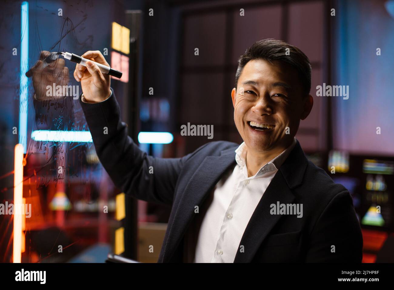 Waist-up portrait of smiling handsome Asian businessman ceo manager in ...