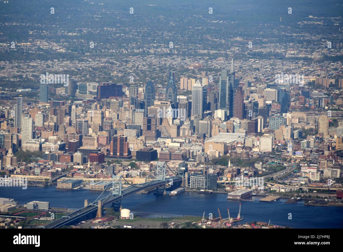 The Benjamin Franklin Bridge over the Delaware River and the downtown ...