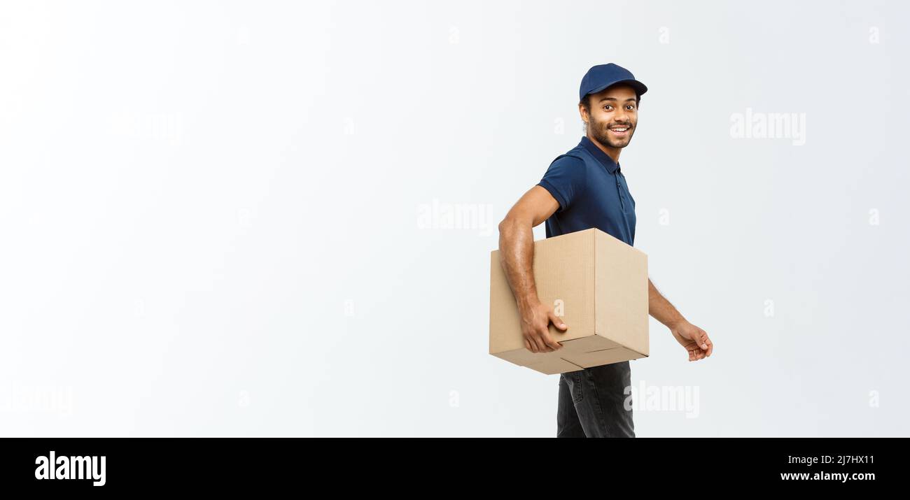 Delivery Concept - Portrait of Happy African American delivery man in ...