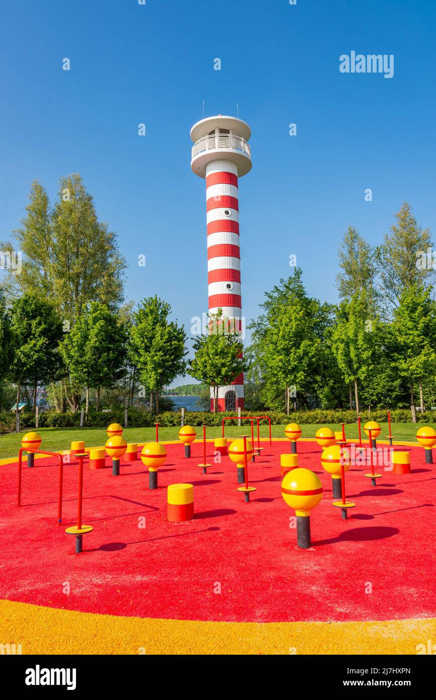 Lighthouse and the outdoor gym equipment in new, modern neighbourhood ...