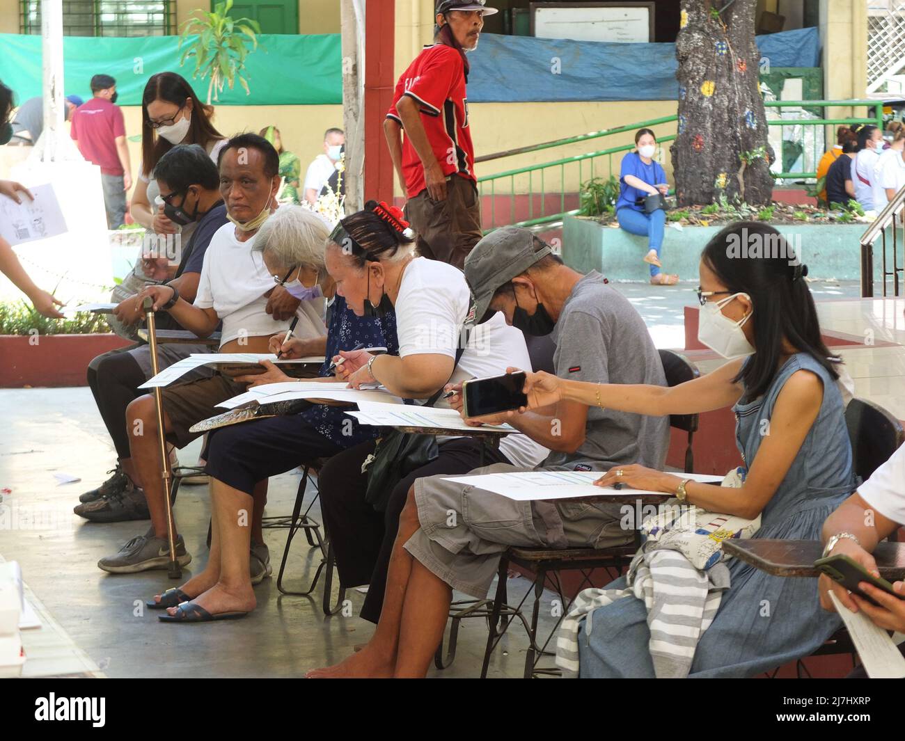 Manila, Philippines. 09th May, 2022. Voters seen filling their election ...