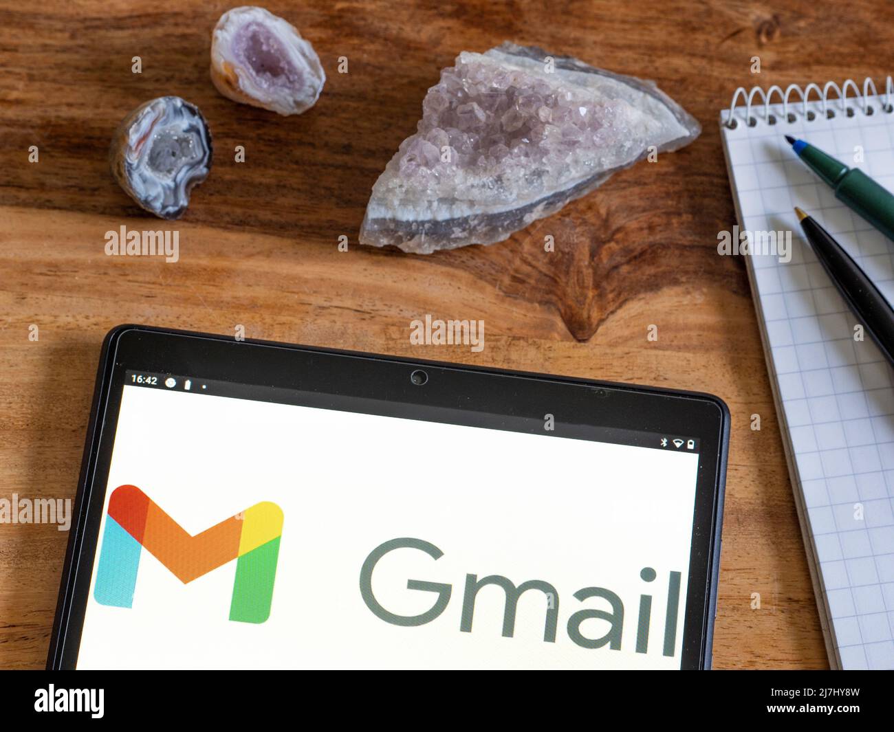 In this photo illustration Gmail logo seen displayed on a tablet Stock ...