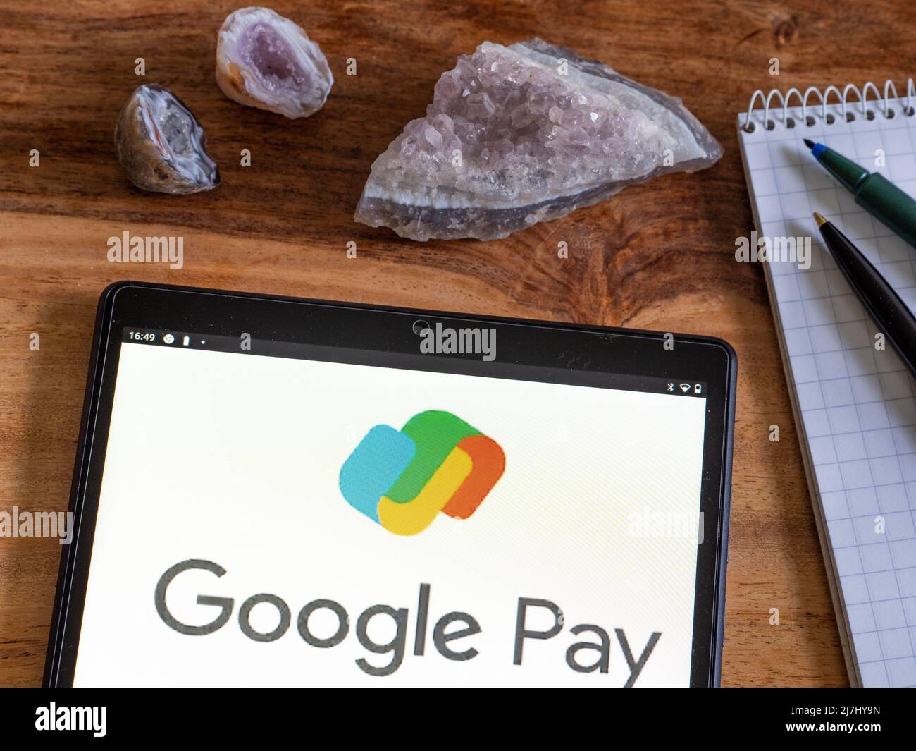 In this photo illustration Google Pay logo seen displayed on a tablet ...